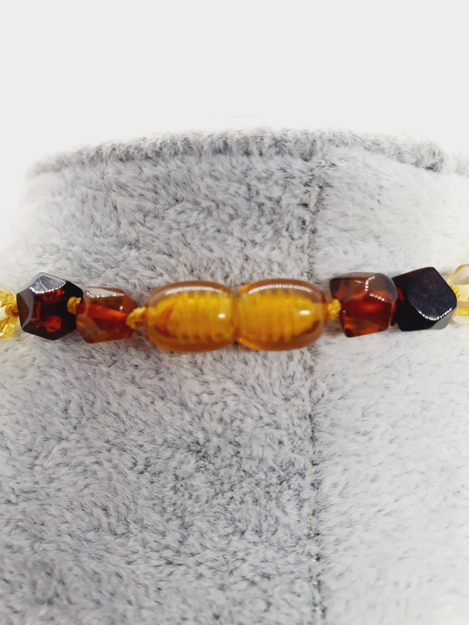 Barnsteen ketting – De Lachende Boedha
